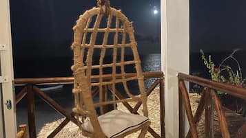 Quarto Duplo Deluxe, vista para a praia | Terraço/pátio interior