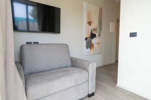 Quarto Triplo JĂșnior | Sala de estar
