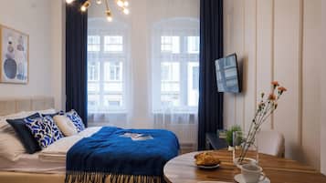 Suíte estúdio clássica | Cortinas blackout, ferros/tábuas de passar roupa, Wi-Fi de cortesia