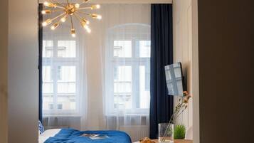 Suíte estúdio clássica | Cortinas blackout, ferros/tábuas de passar roupa, Wi-Fi de cortesia