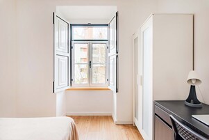 Apartamento família, 2 quartos, para não fumantes | 2 quartos, ferros/tábuas de passar roupa, Wi-Fi de cortesia