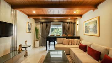 Suite | Sala de estar | Televisor LCD de 32 polegadas com canais por cabo