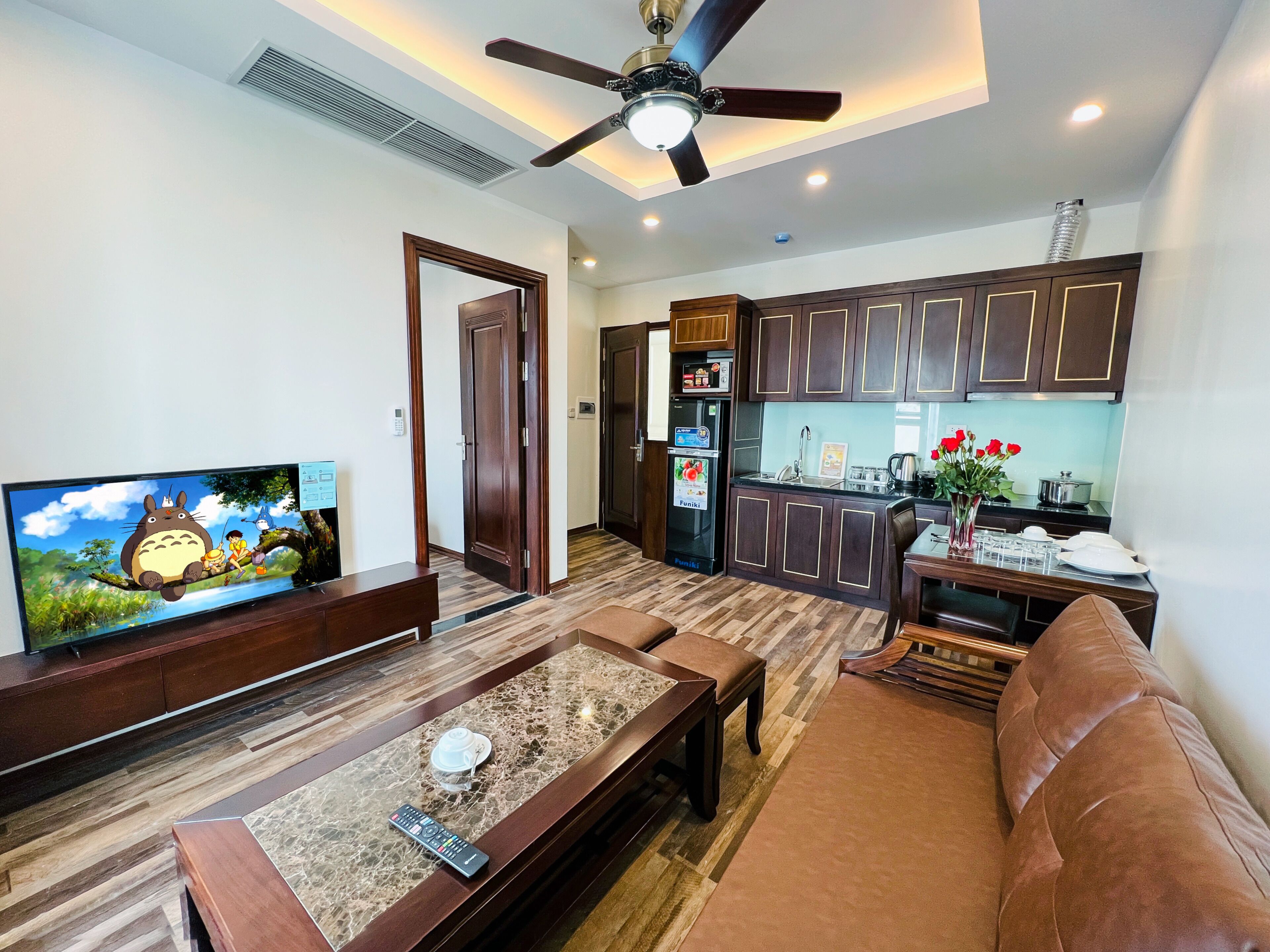 Apartamento de Luxo, 1 quarto, varanda | Sala de estar | Televisor 