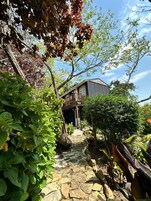 Casa, 1 quarto, para fumantes, sacada | Jardim