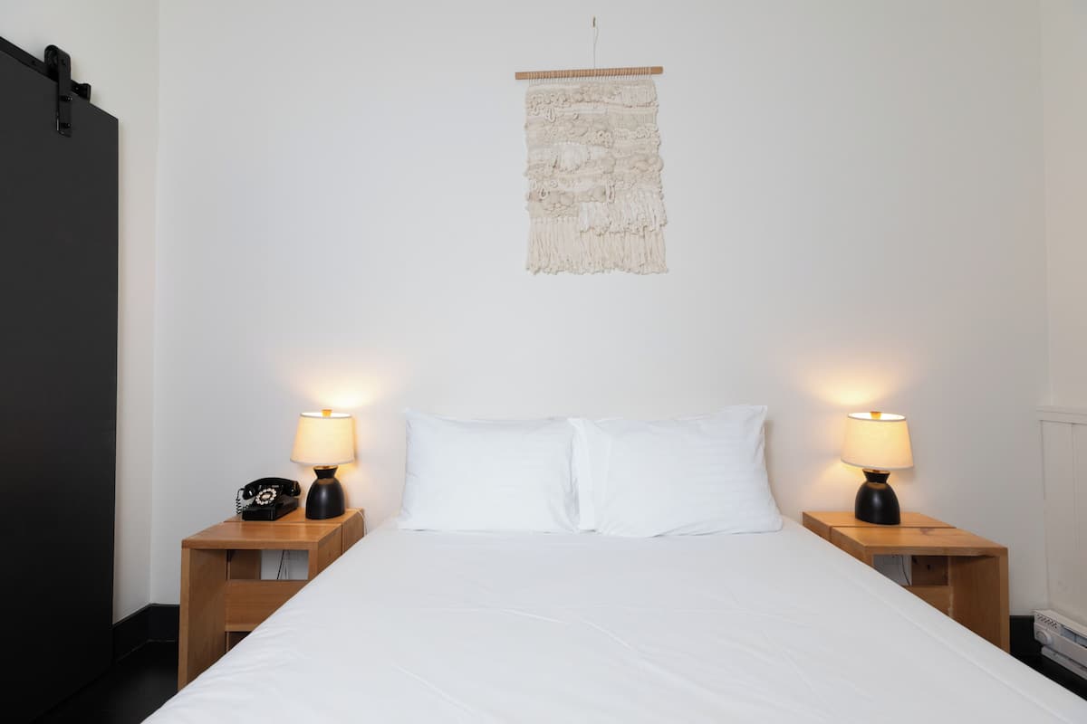 Suíte (Hunter) | Lençóis italianos Frette, roupas de cama premium, cofres nos quartos