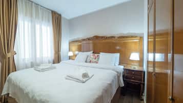 Apartamento luxo | 2 quartos, roupas de cama premium, cofres nos quartos