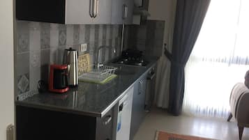 Estúdio família, sacada, vista para a montanha | Cozinha privada