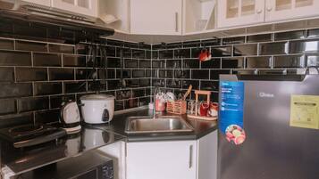 Apartamento em Condomínio Fechado, 1 quarto, pátio | Interior