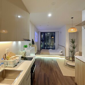 Suíte estúdio básica | 1 quarto, roupas de cama premium, frigobar, escrivaninha