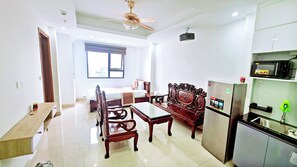 Suíte básica | Área de estar | TV