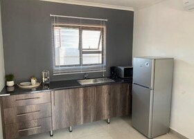 Quarto conforto | Cozinha privada | Geladeira, micro-ondas