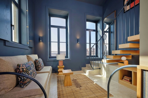 Suite, 1 cama king-size, não fumadores, vista para o rio | Roupa hipoalergénica, minibar com produtos grátis, cofre no quarto