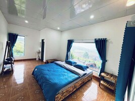 Quarto solteiro, vista para a montanha, no piso térreo | Cortinas blackout, ferros/tábuas de passar roupa, Wi-Fi de cortesia