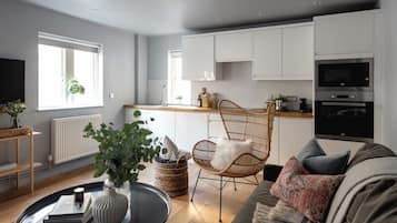 Apartamento luxo | Área de estar | TV LED 32 polegadas com canais digitais