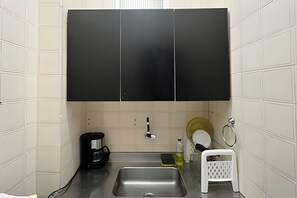 Apartamento básico | Cozinha privada | Produtos de limpeza