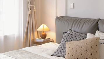 Apartamento superior, vista para a cidade | 4 quartos, berços grátis, Wi-Fi de cortesia, roupa de cama