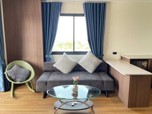 Suíte | Frigobar, escrivaninha, quartos à prova de som, Wi-Fi de cortesia