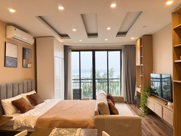 Apartamento, vista para o lago, junto ao lago | Sala de estar