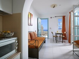 Suite Familiar, varanda, vista para o mar | Cofre no quarto, cortinas/cortinados opacos, quartos insonorizados