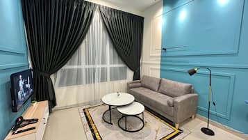 Apartamento, 2 quartos | Área de estar