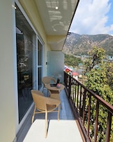 Quarto premium, sacada | Terraço/pátio