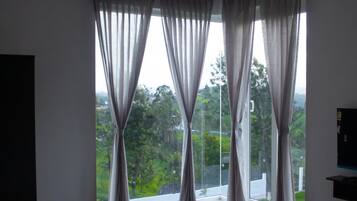 Quarto Duplo Superior, vista para o jardim