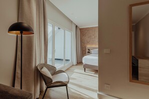 Suite Júnior, vista para o oceano | Cofre no quarto, cortinas/cortinados opacos, ferro/tábua de engomar 
