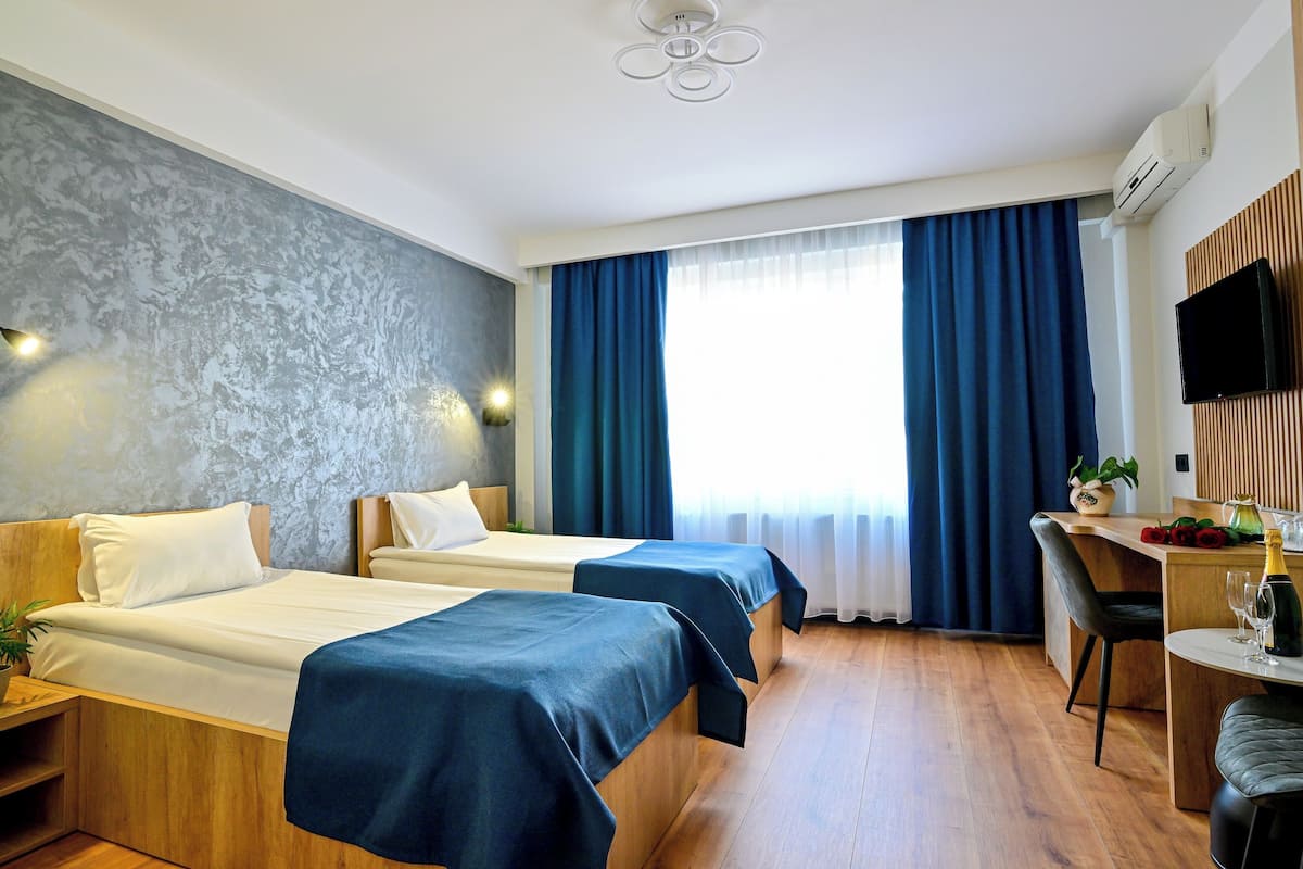 Quarto casal ou duplo | 1 quarto, Wi-Fi de cortesia, roupa de cama