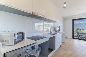 Estúdio conforto, sacada, vista para a cidade | Cozinha privada