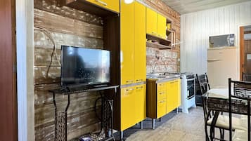 Apartamento | Cozinha privada | Uma torradeira