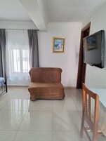 Estúdio família, varanda, vista para o pátio | Cortinas blackout, Wi-Fi de cortesia