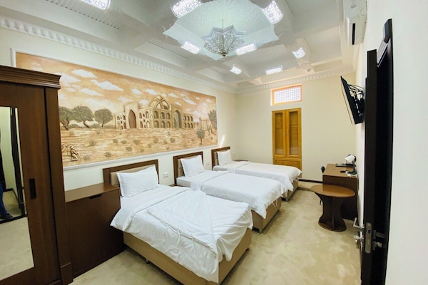 Quarto Duplo ou Twin Deluxe, 1 quarto, vista para o pátio | Quartos insonorizados, ferro/tábua de engomar