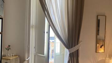 Quarto Quádruplo Comfort, não fumadores, varanda | Varanda