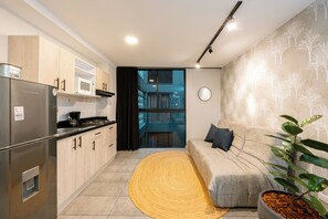 Apartamento Comfort em Condomínio Fechado | 1 quarto, secretária adequada para computadores portáteis, Wi-fi grátis