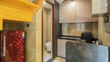 Quarto Deluxe, varanda, Vista para a cidade | Kitchenette privada