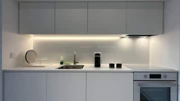 Apartamento Comfort, varanda, Vista para a cidade | Cozinha privada