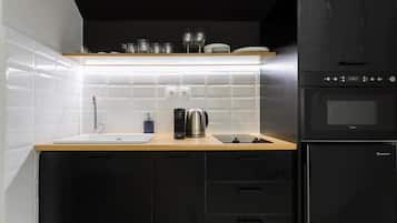 Apartamento, varanda | Kitchenette privada