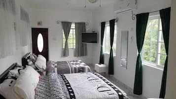 Suíte estúdio família, vista para a montanha | 1 quarto, cortinas blackout, ferros/tábuas de passar roupa
