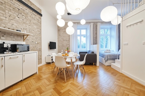 Apartamento conforto, vista para a cidade | Área de estar