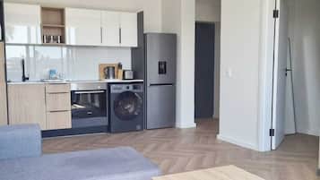 Apartamento standard, vista para a cidade | Cozinha privada