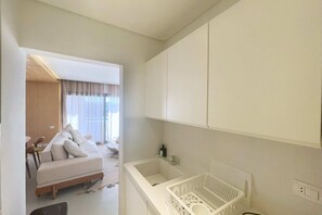 Apartamento Básico | Sala de estar | Televisor