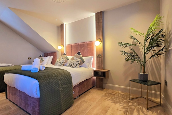 Quarto triplo luxo | Camas com colchões de espuma com sistema de memória