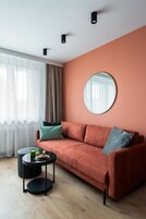 Apartamento Superior, Vista para a cidade | Sala de estar | Smart TV de 50 polegadas com canais por cabo, Netflix 