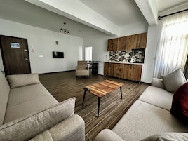Apartamento Comfort, varanda, vista para o jardim | Sala de estar