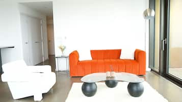 Apartamento luxo, 1 cama de casal | Área de estar