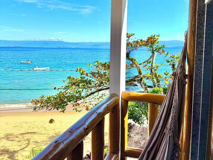 Suíte conforto, vista para a praia | Terraço/pátio
