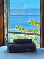 Suíte conforto, vista para a praia | 1 quarto, cofres nos quartos, escrivaninha