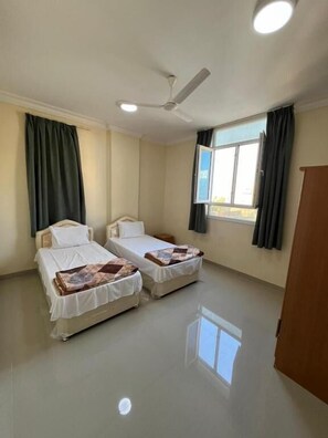 Apartamento econômico, 2 quartos | Vista do quarto