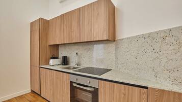 Apartamento | Cozinha privada | Utensílios de cozinha