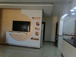 Casa Deluxe, vista para a montanha | Sala de estar | TV de ecrã plano, leitor de DVD 